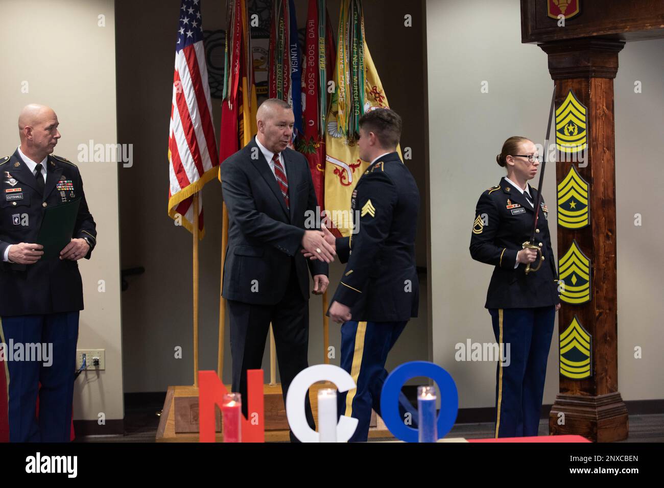 Sgt. Shawn Ward, 3rd Battalion, 27th Field Artillery Regiment, shakes ...