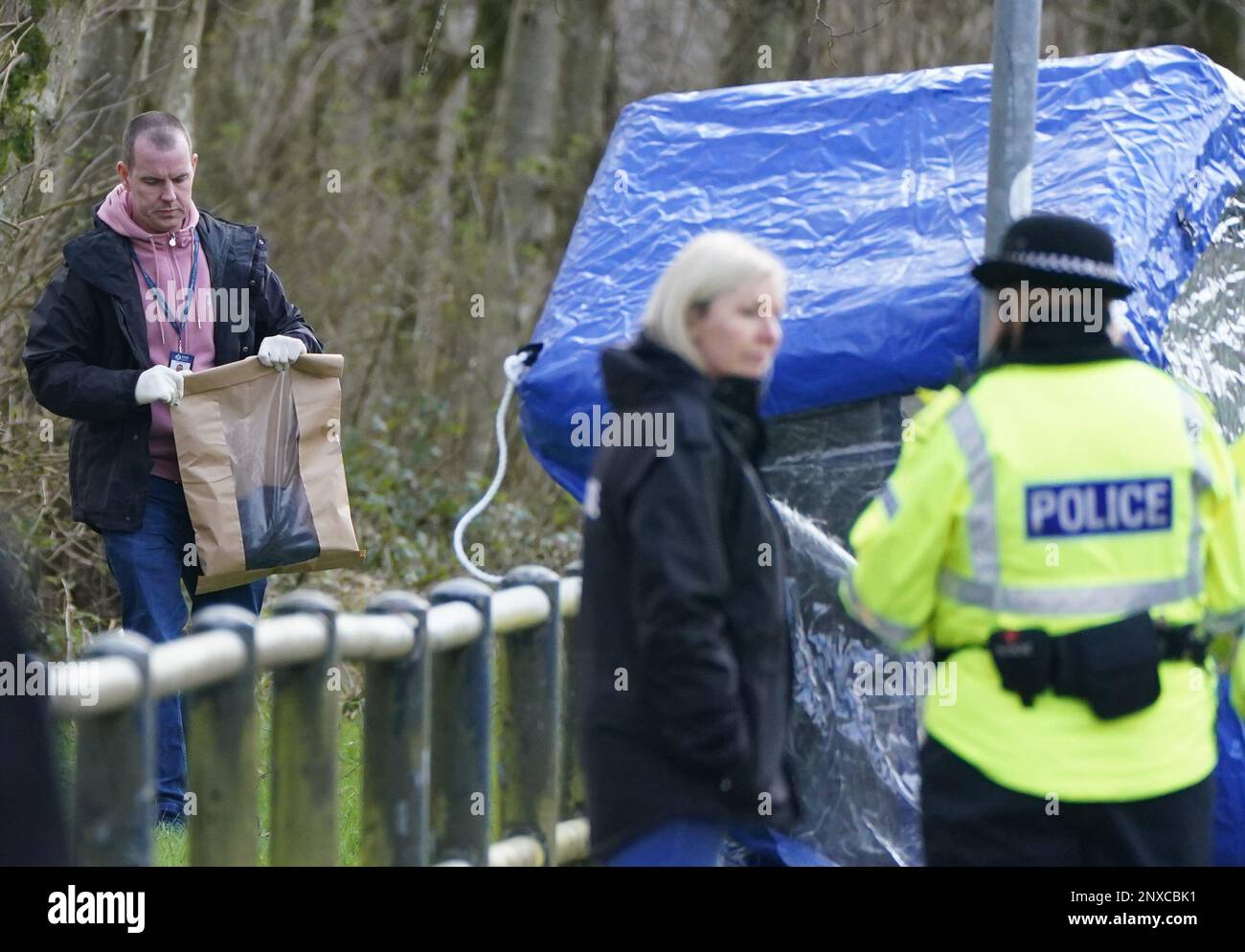 Police at the scene on Nairn Road in Greenock, as a murder ...