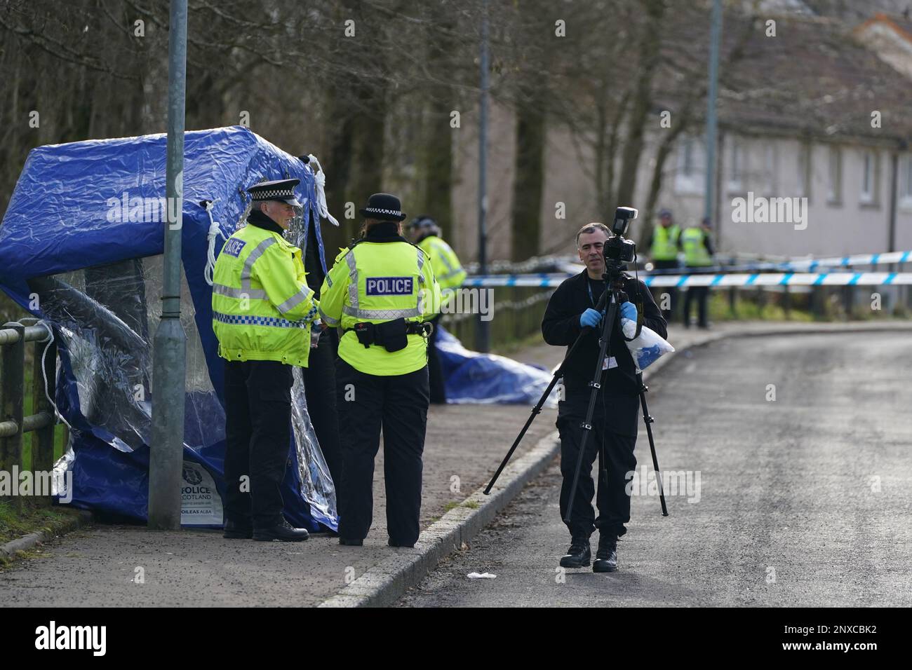 Police at the scene on Nairn Road in Greenock, as a murder ...