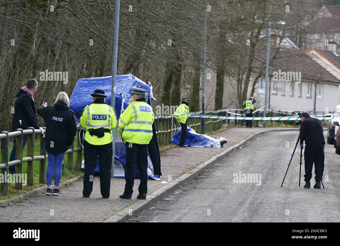 Police at the scene on Nairn Road in Greenock, as a murder ...