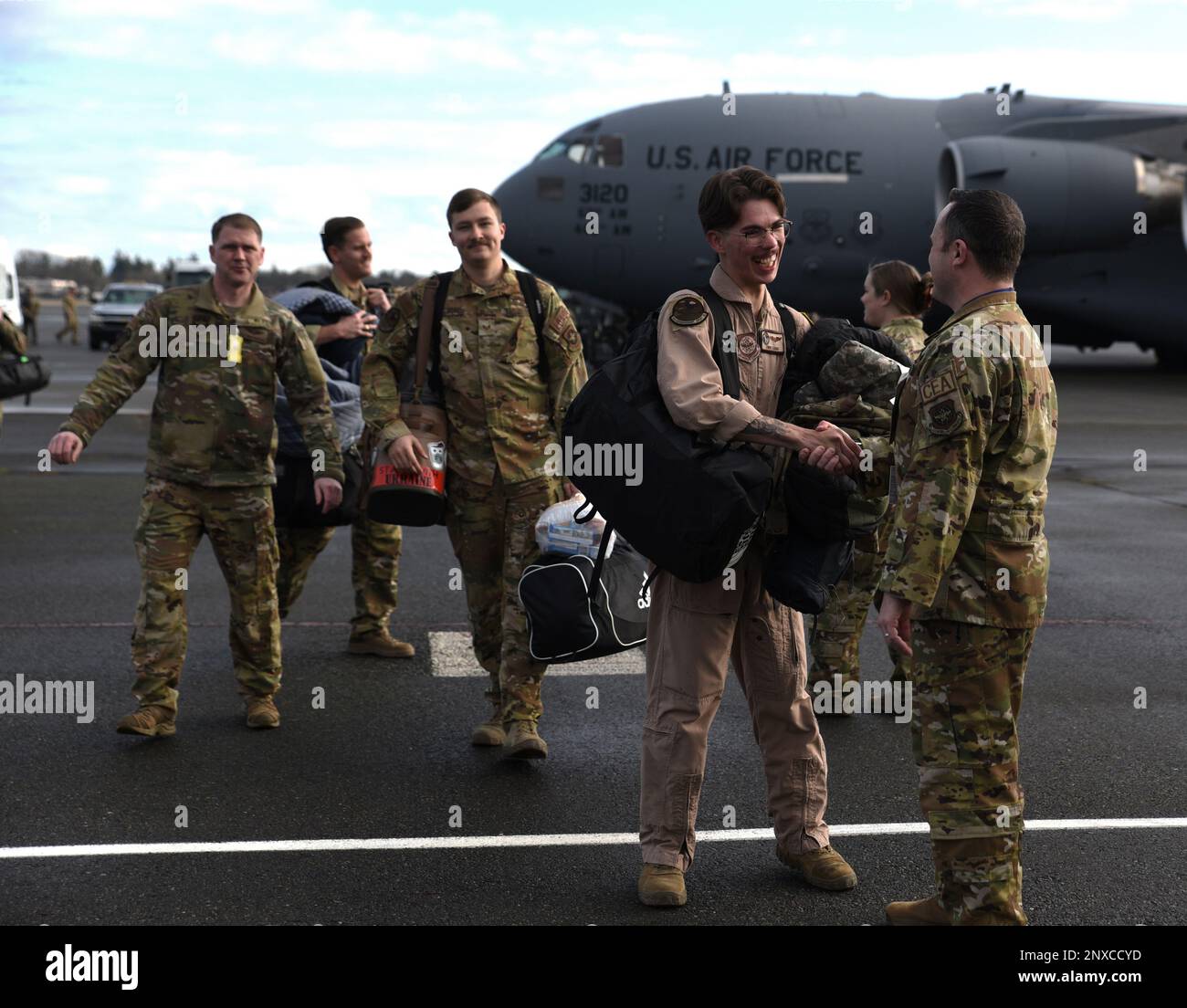 U.S. Airmen reunite with family and friends after returning from a ...