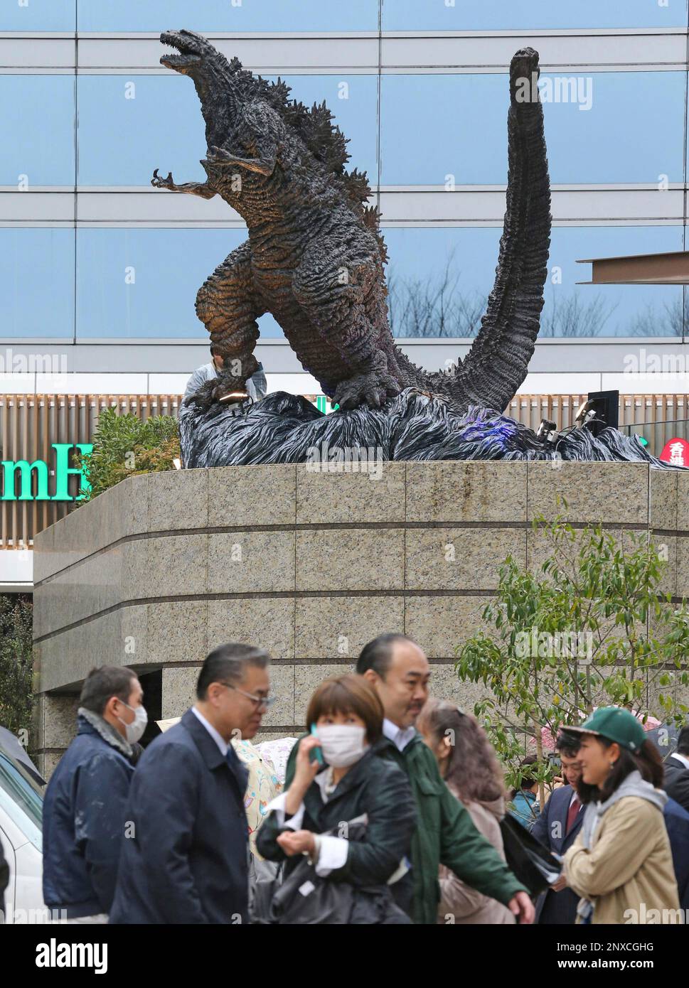 New Godzilla statue is unveiled during the opening ceremony at "Hibiya ...