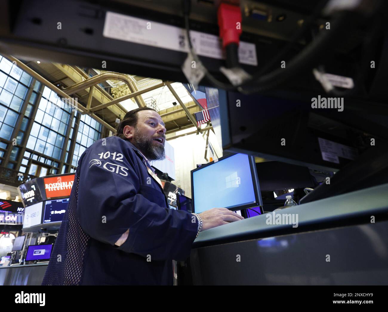 New York, United States. 01st Mar, 2023. Traders work on the floor of ...