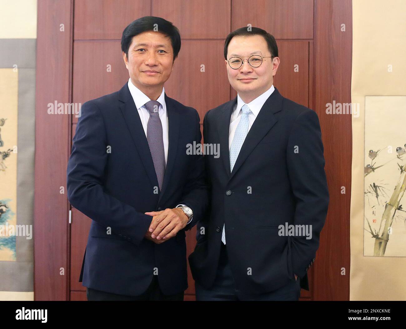 Dao Doc Nghia (left), chairman of Cotec Healthcare and Cotec Group and ...