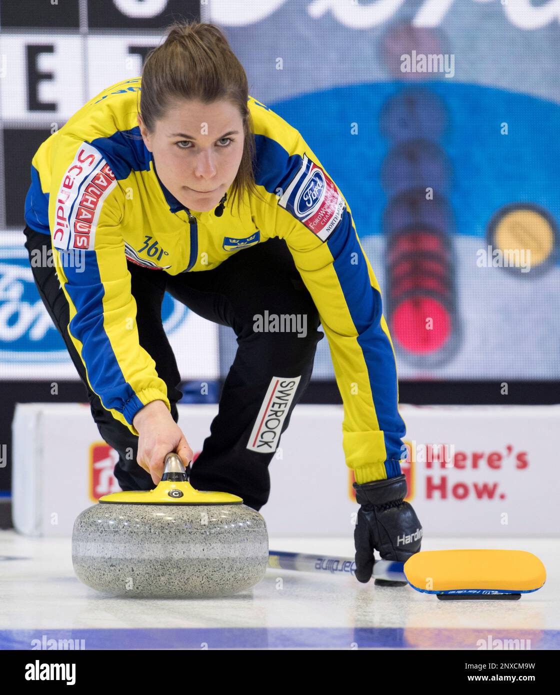 Sweden skip Anna Hasselborg fires a shot as they face Switzerland at ...