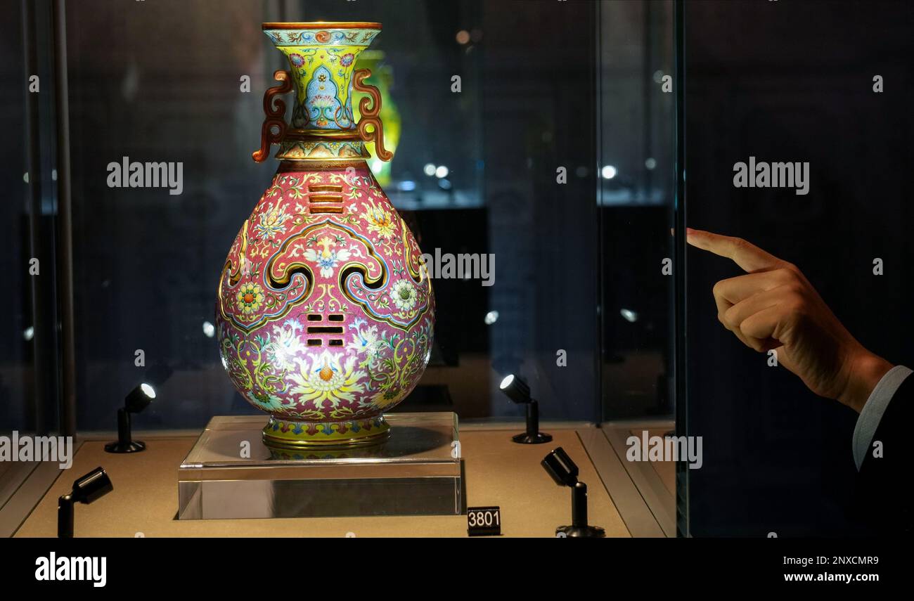 A Magnificent Ruby-Ground Yangcai 'Trigrams' Reticulated Vase, Seal ...