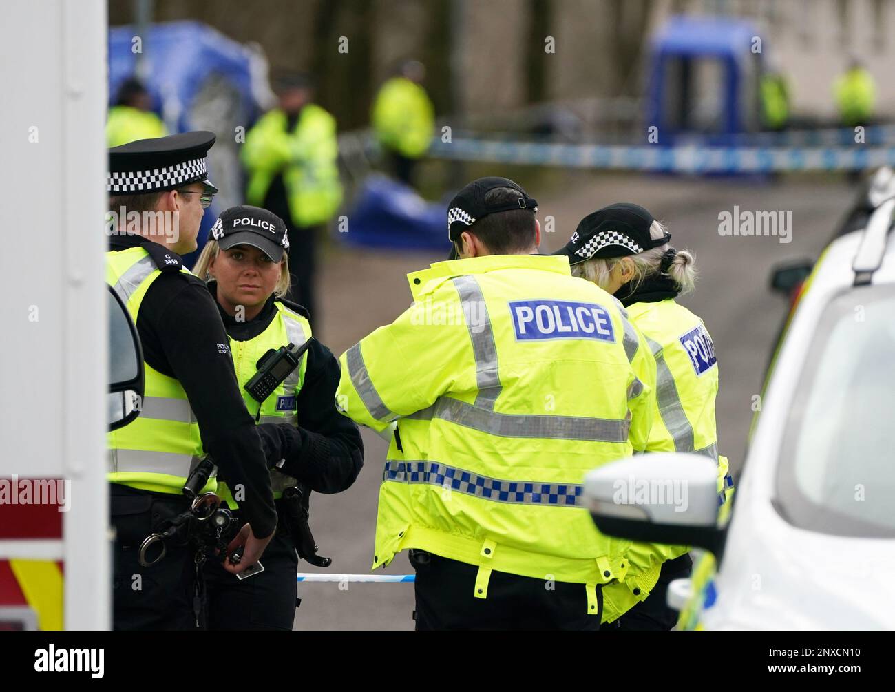Police at the scene on Nairn Road in Greenock, as a murder ...