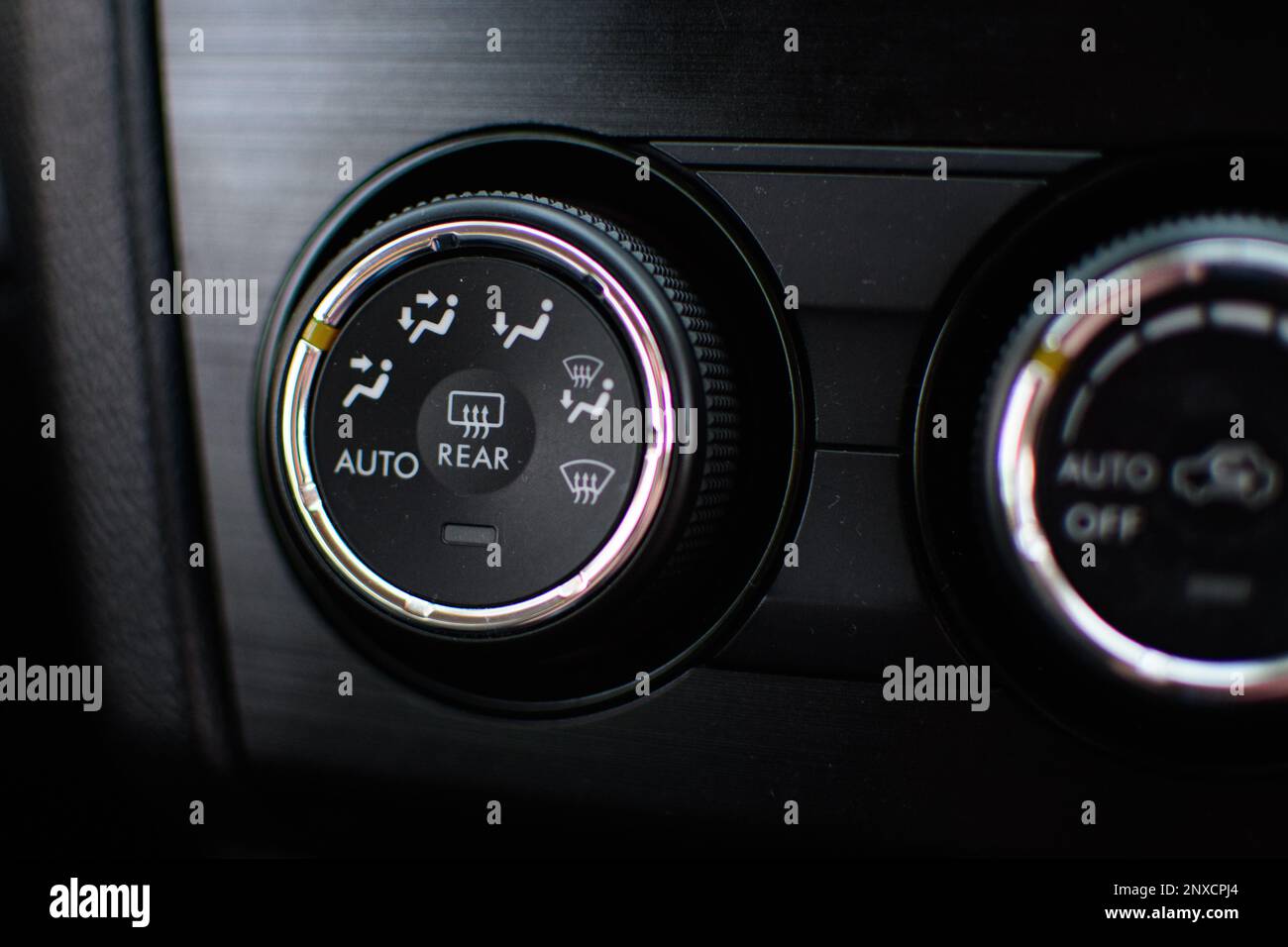 Car climate control fan directional control knob Stock Photo - Alamy