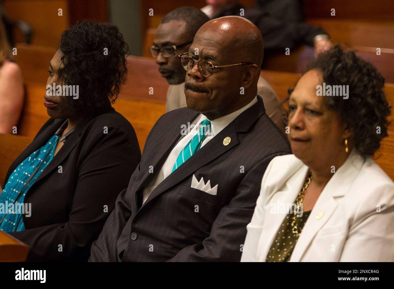 Fulton County District Attorney Paul Howard (C) observes the Tex McIver ...