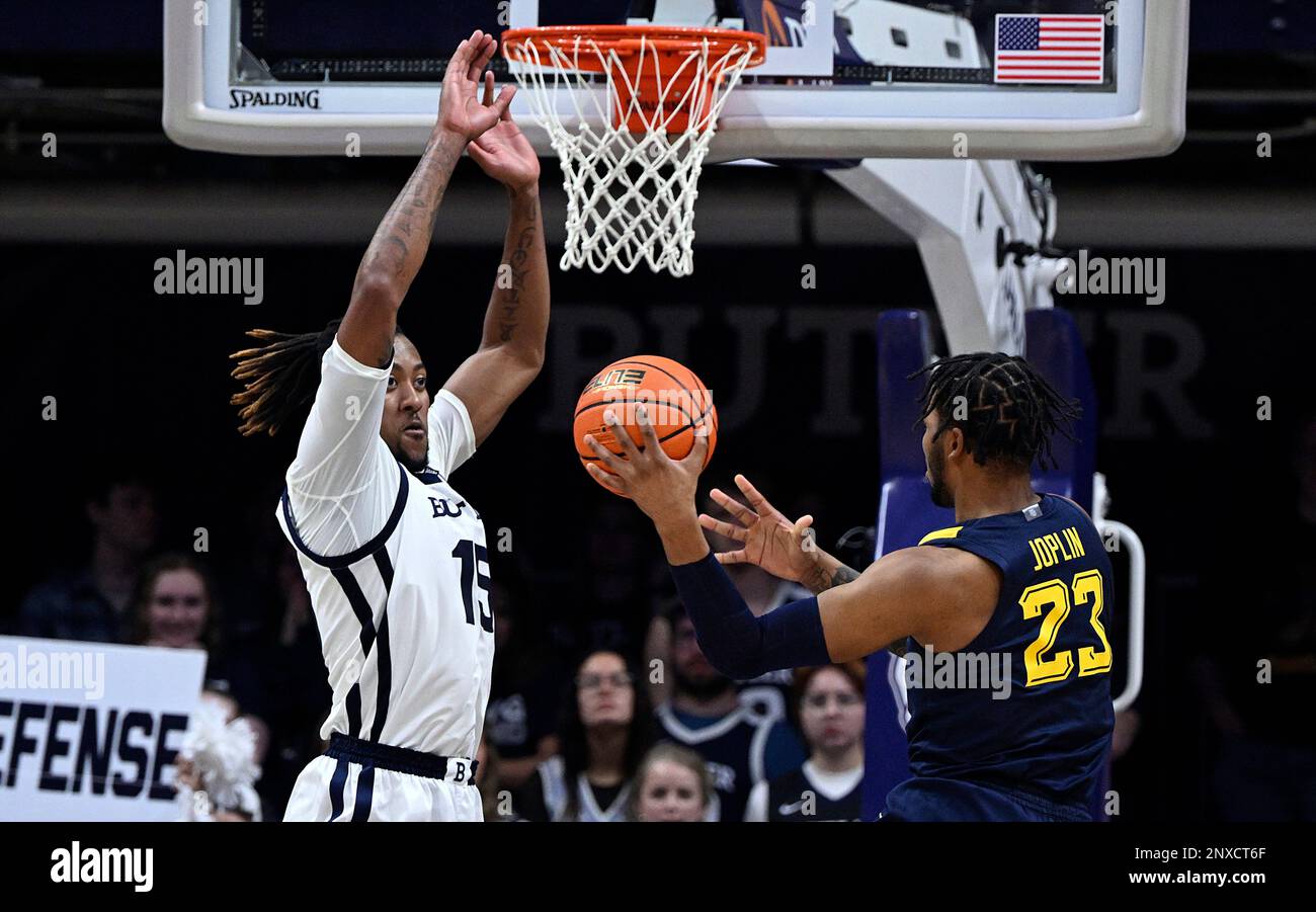 Butler center Manny Bates (15) moves to try to block a shot by ...