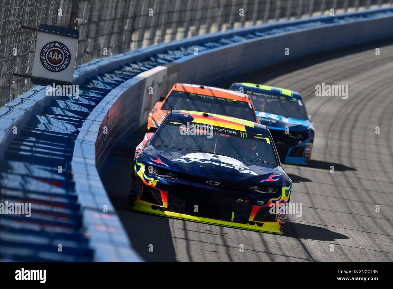 William Byron (24) leads a pack of cars during the Auto Club 400 at ...