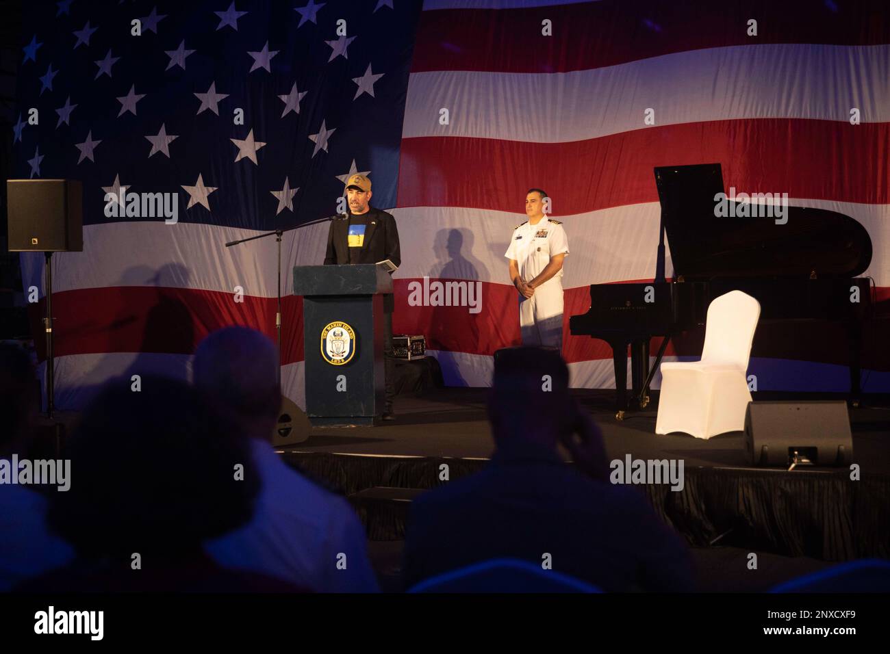 Jonathan Kaplan, the U.S. ambassador to Singapore, is joined on stage ...