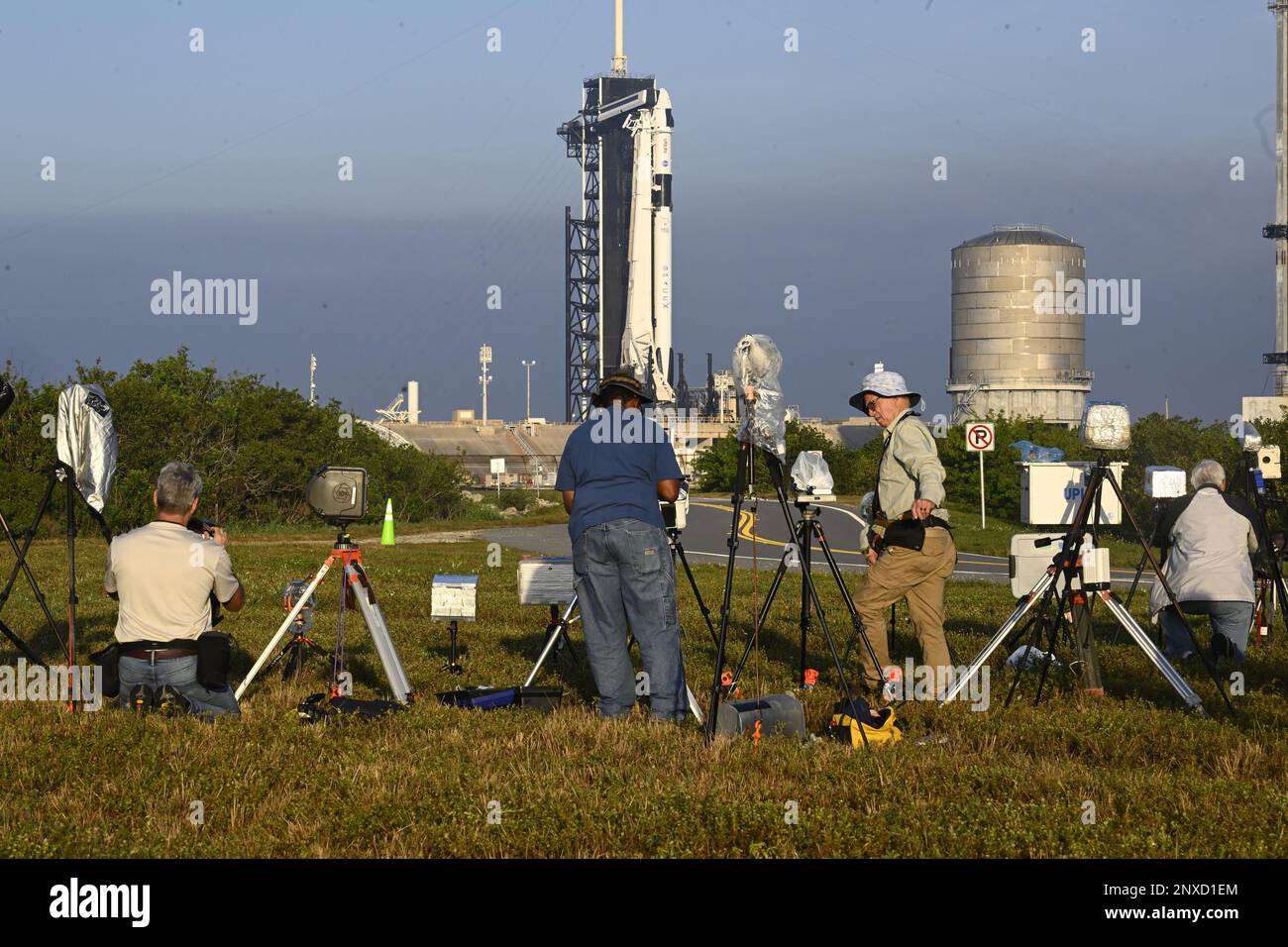Media photographers reset their remotely activated cameras as the ...