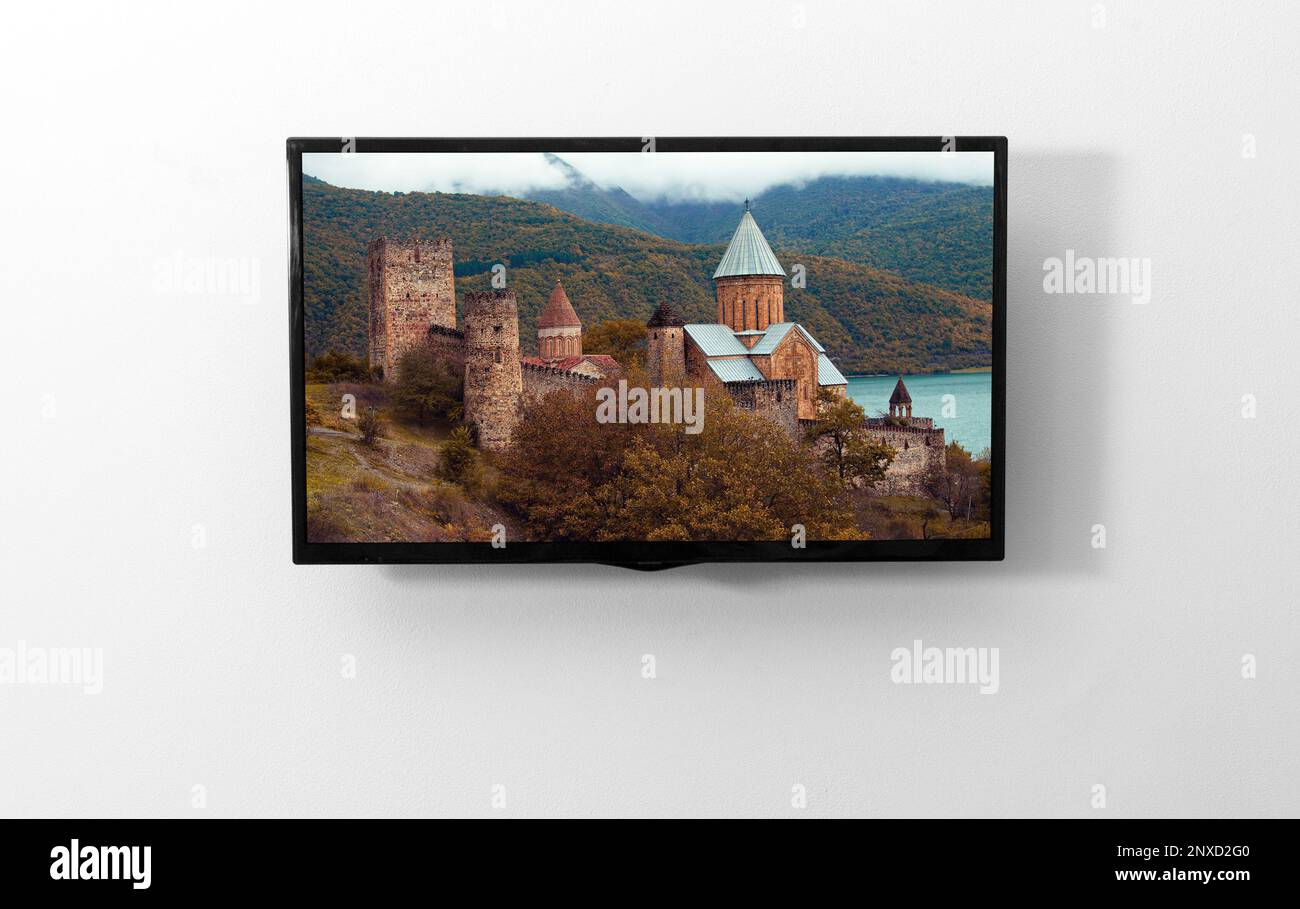 TV monitor on the wall Stock Photo - Alamy