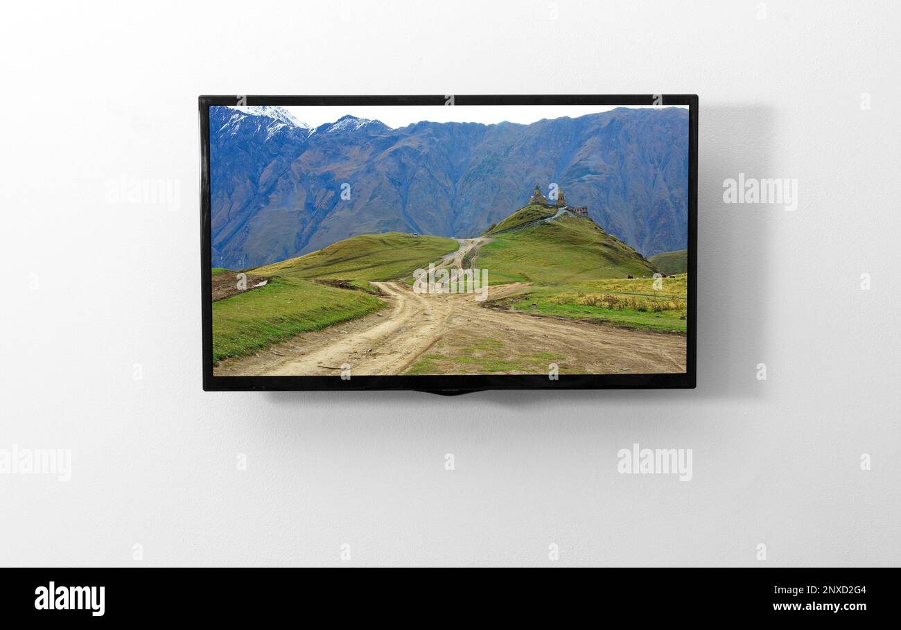 TV monitor on the wall Stock Photo - Alamy