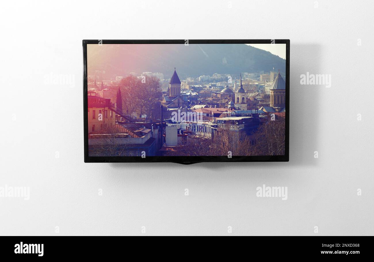 TV monitor on the wall Stock Photo - Alamy