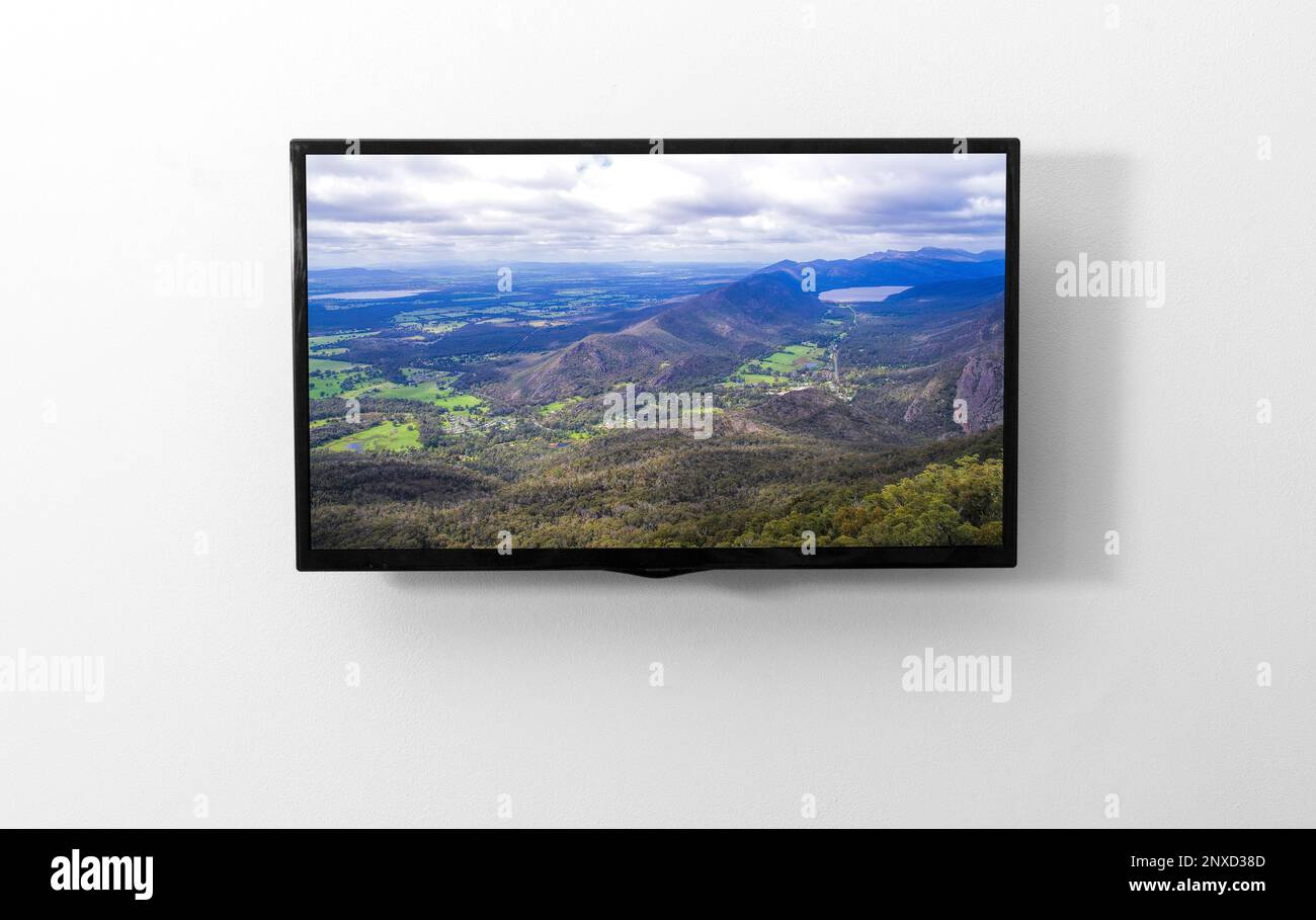 TV monitor on the wall Stock Photo - Alamy