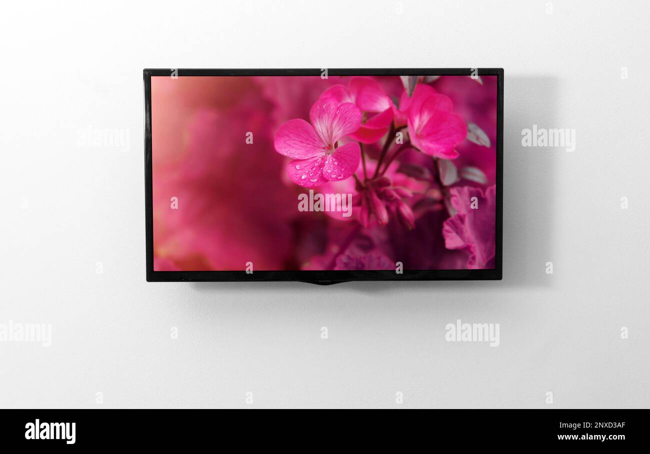 TV monitor on the wall Stock Photo - Alamy