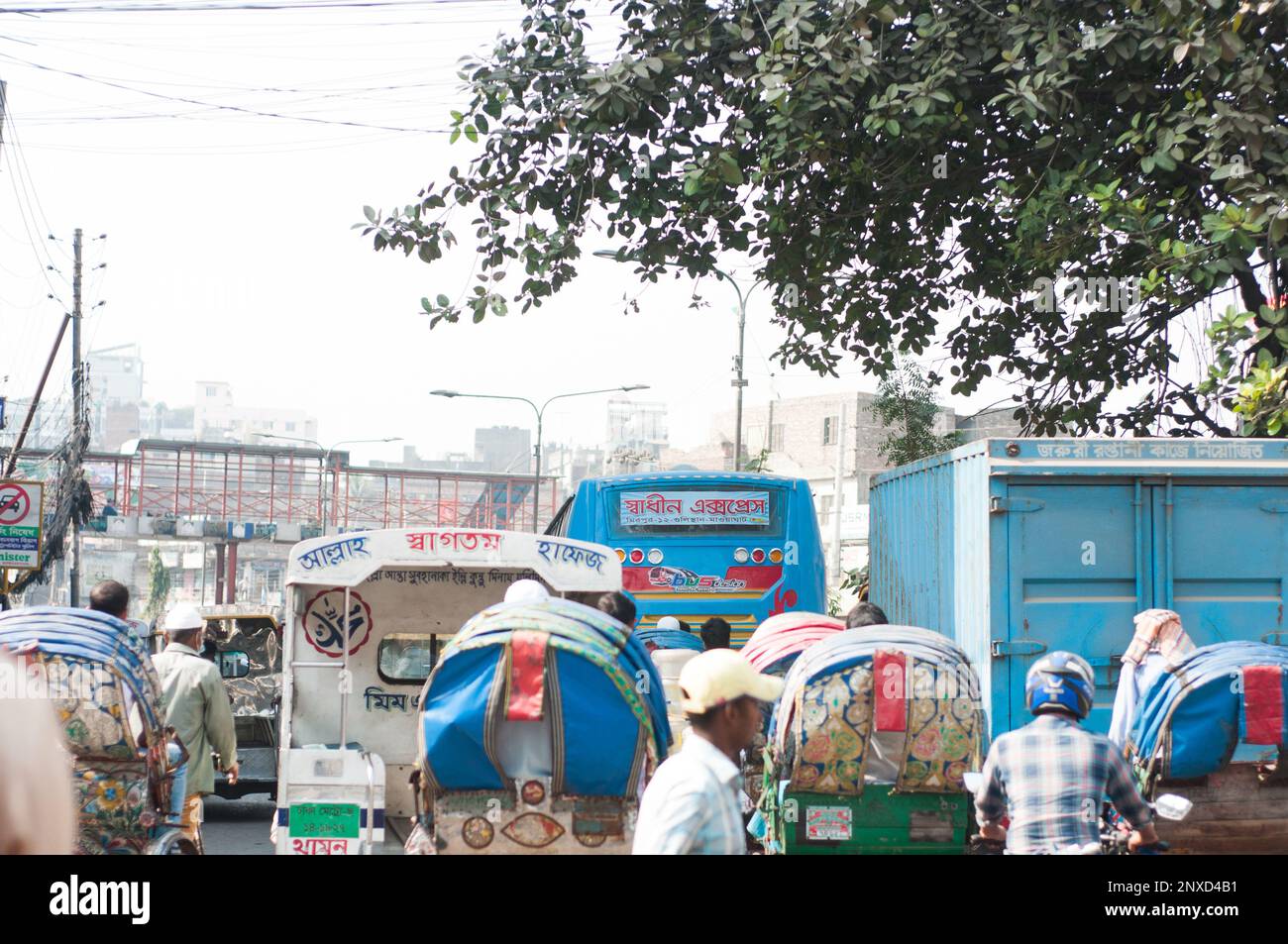 Dhaka city busy street scene and underprivileged people Stock Photo - Alamy