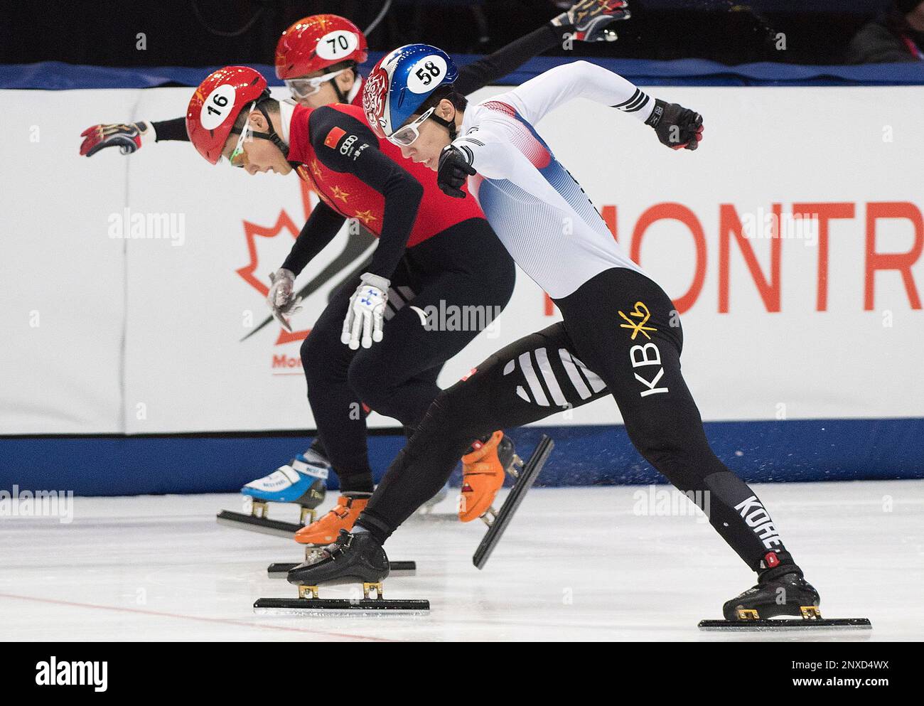 Hwang Dae Heon (58), of South Korea, crosses the line ahead of China's ...