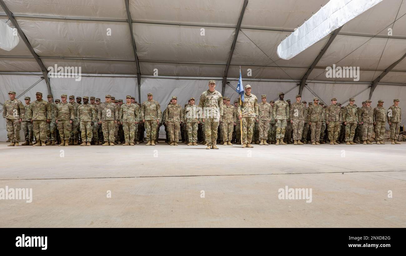 Soldiers assigned to the 378th Air Expeditionary Wing stand at parade ...