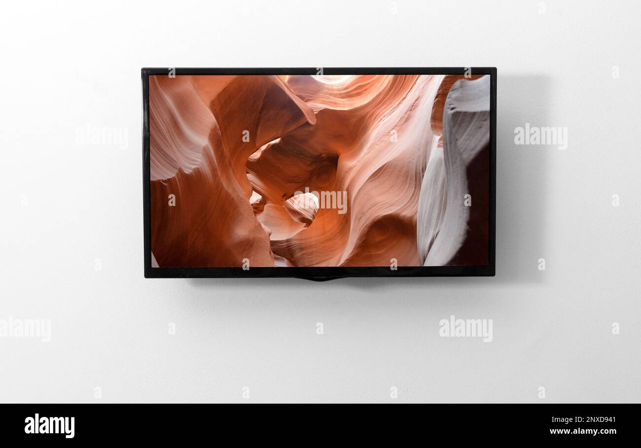 TV monitor on the wall Stock Photo - Alamy
