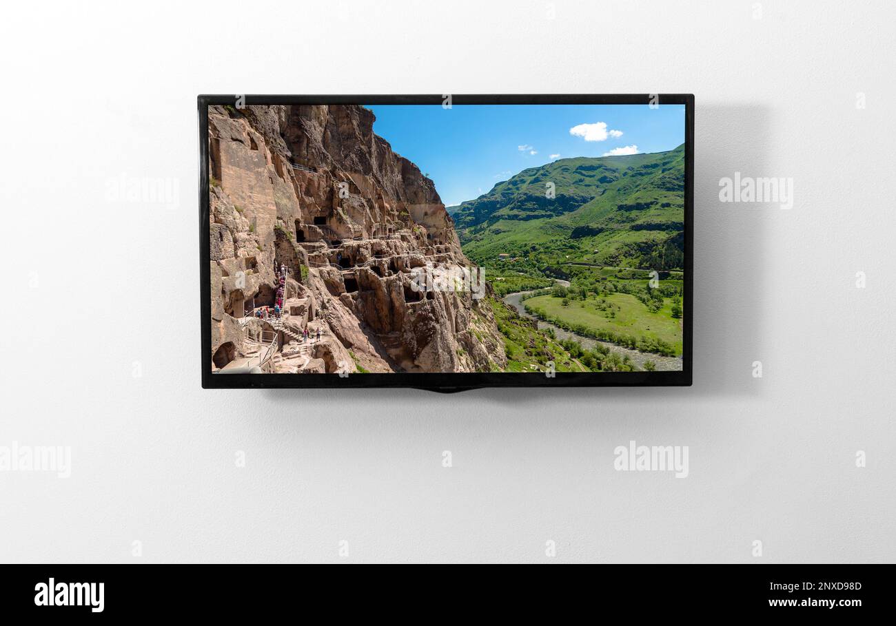 TV monitor on the wall Stock Photo - Alamy