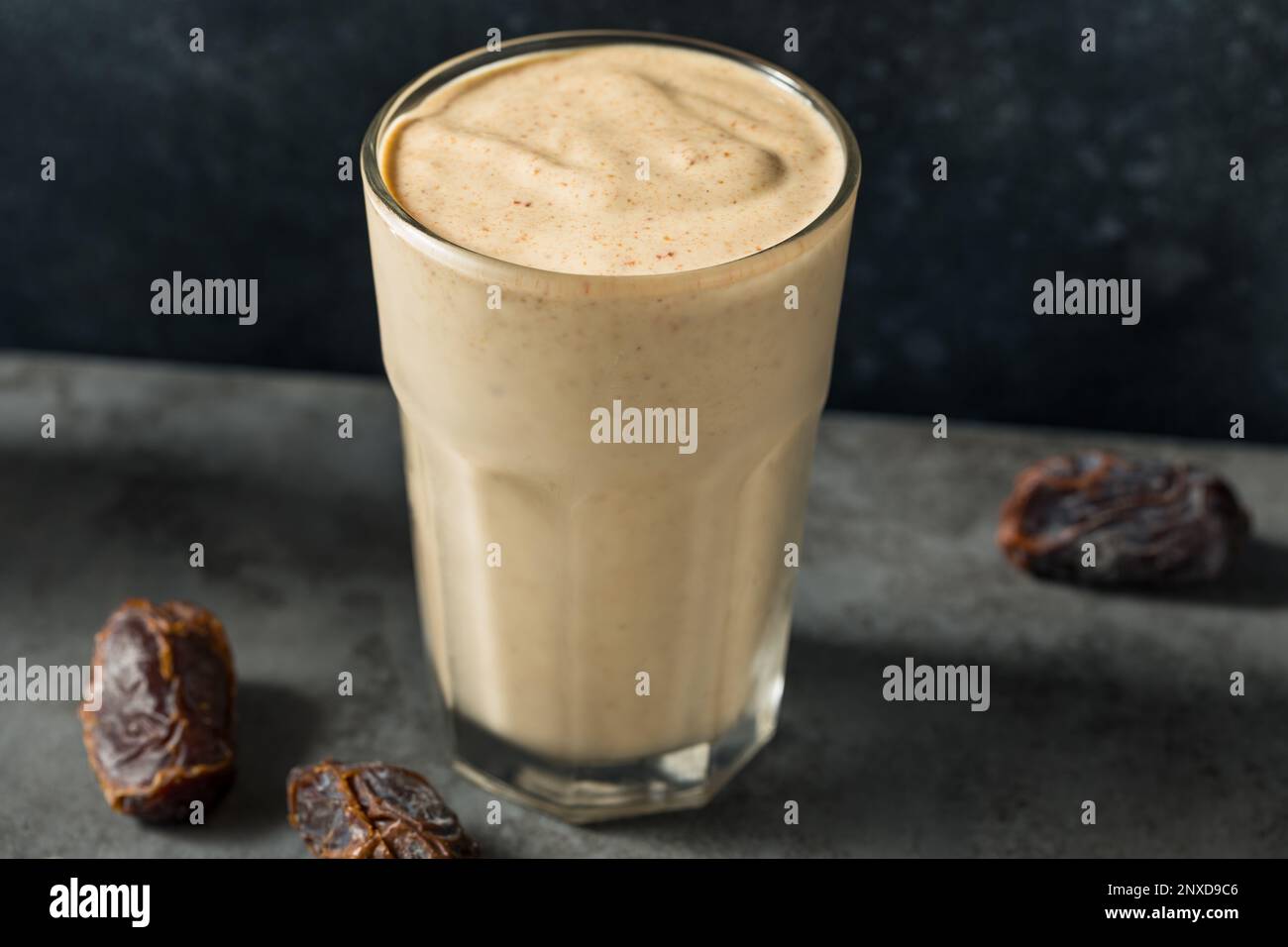 Homemade Sweet Date Milkshake with Ice Cream Stock Photo - Alamy
