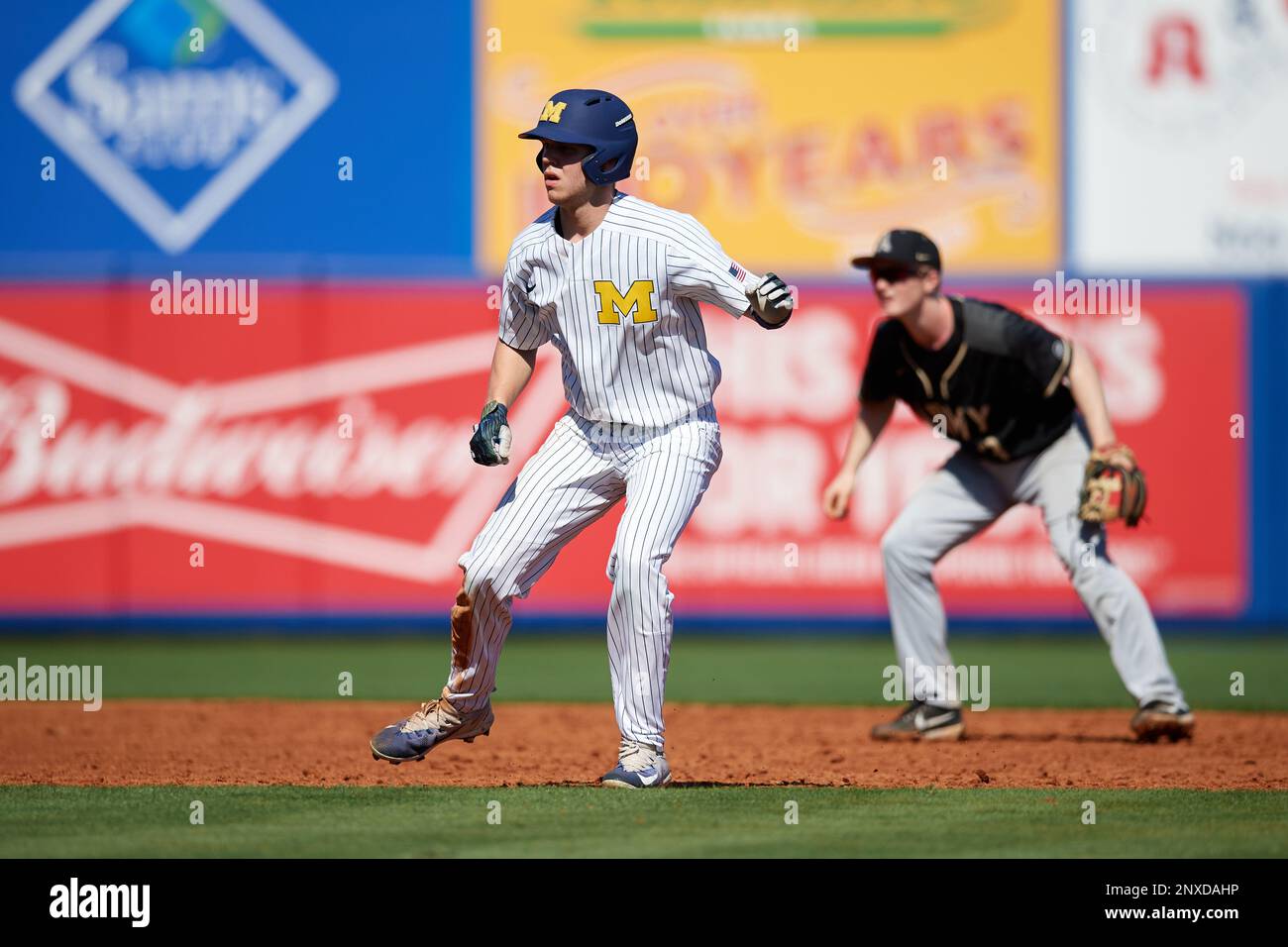 Michigan Wolverines designated hitter Dominic Clementi (13) leads off ...