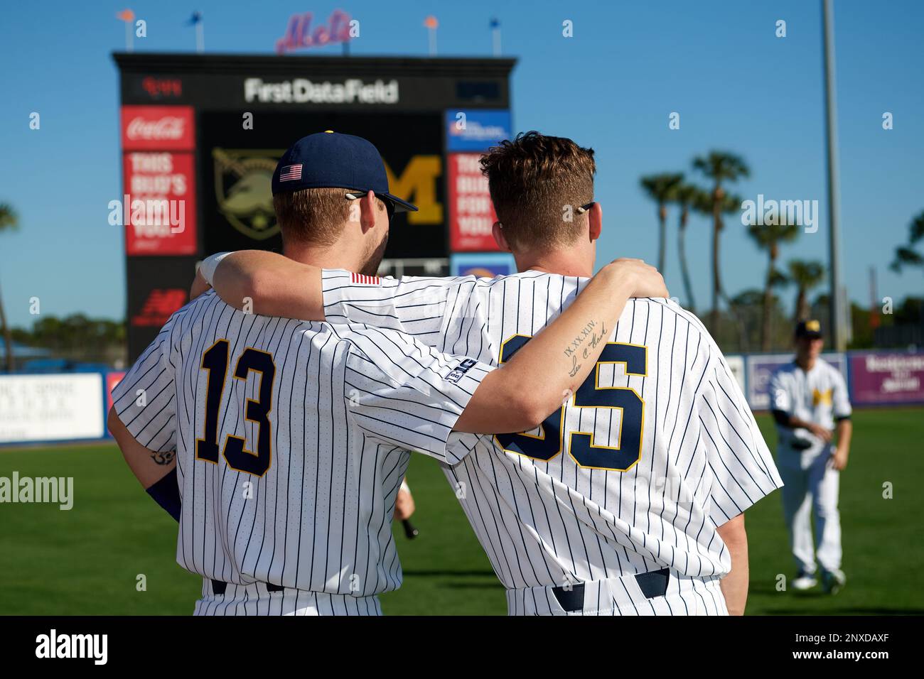Michigan Wolverines Dominic Clementi (13) and Brock Keener (35) before ...