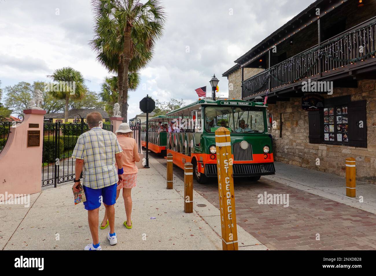 People riding the Old Town Trolley through the historic streets of St ...