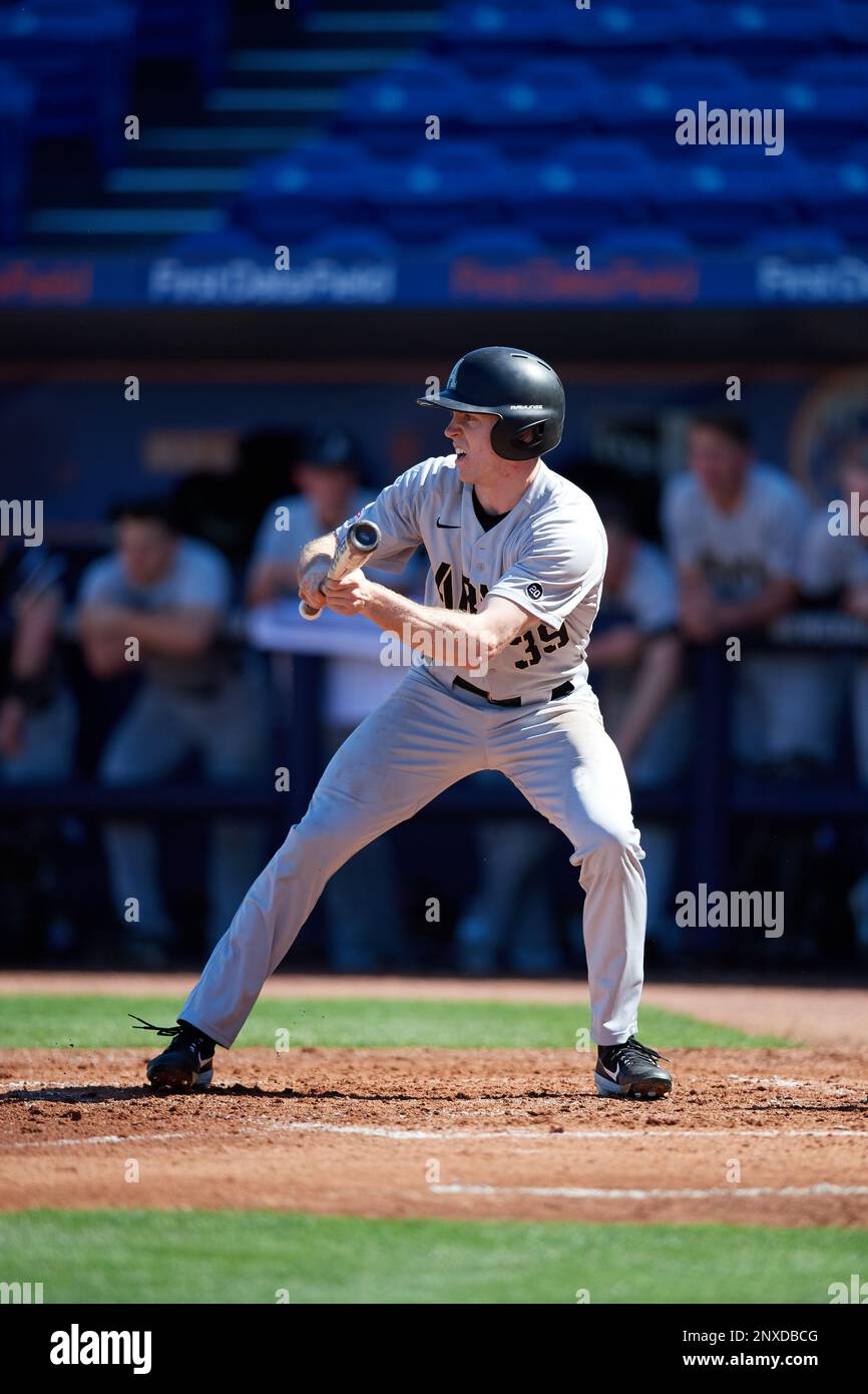 Army West Point center fielder Jacob Hurtubise (39) squares to bunt ...