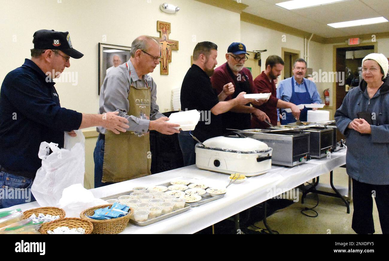 In this Friday, March 9, 2018 photo, volunteers Gary Corley, from left ...