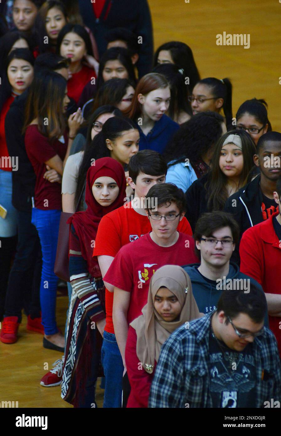 Scranton High School senior students converge in a line in the ...
