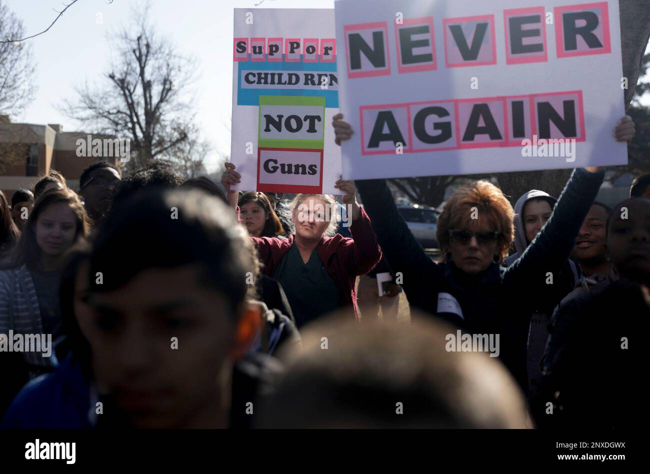 Sandy Cunningham, whose daughter helped organize the protest, stands ...