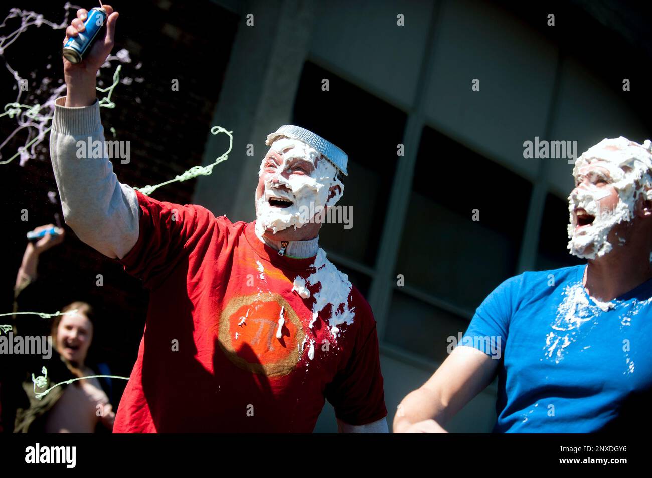 David Jones, left, retaliates with silly string Wednesday, March 14 ...