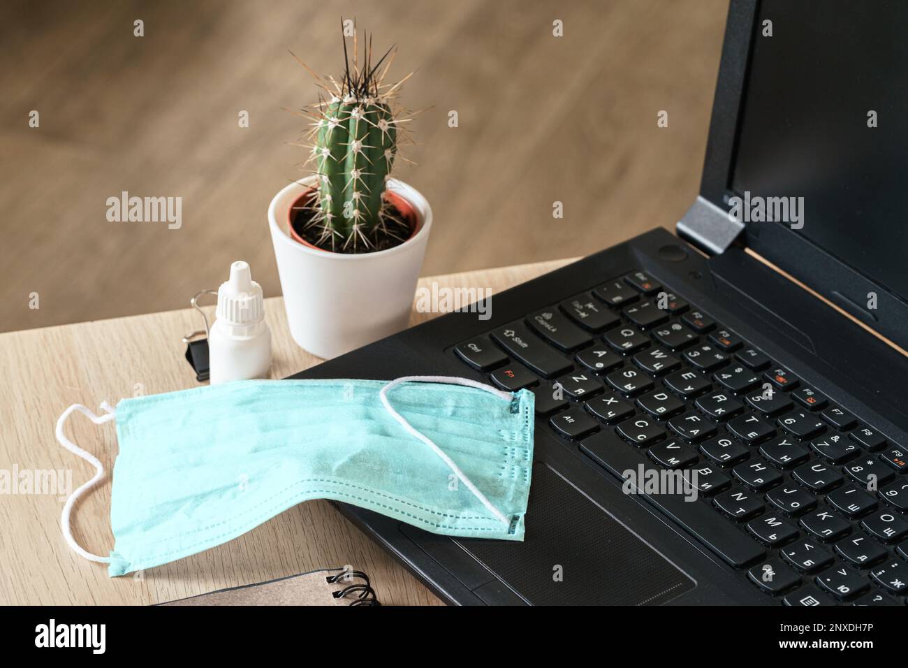 Medical protective mask on office table. Coronavirus spread prevention ...