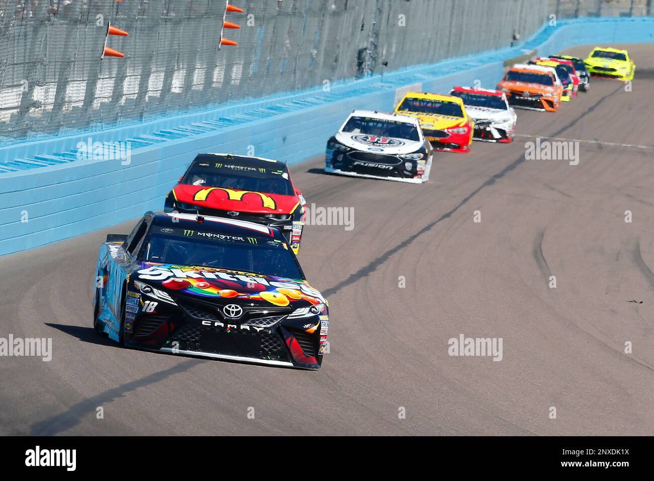 Kyle Busch (18) and Jamie McMurray (1) during the NASCAR TicketGuardian ...
