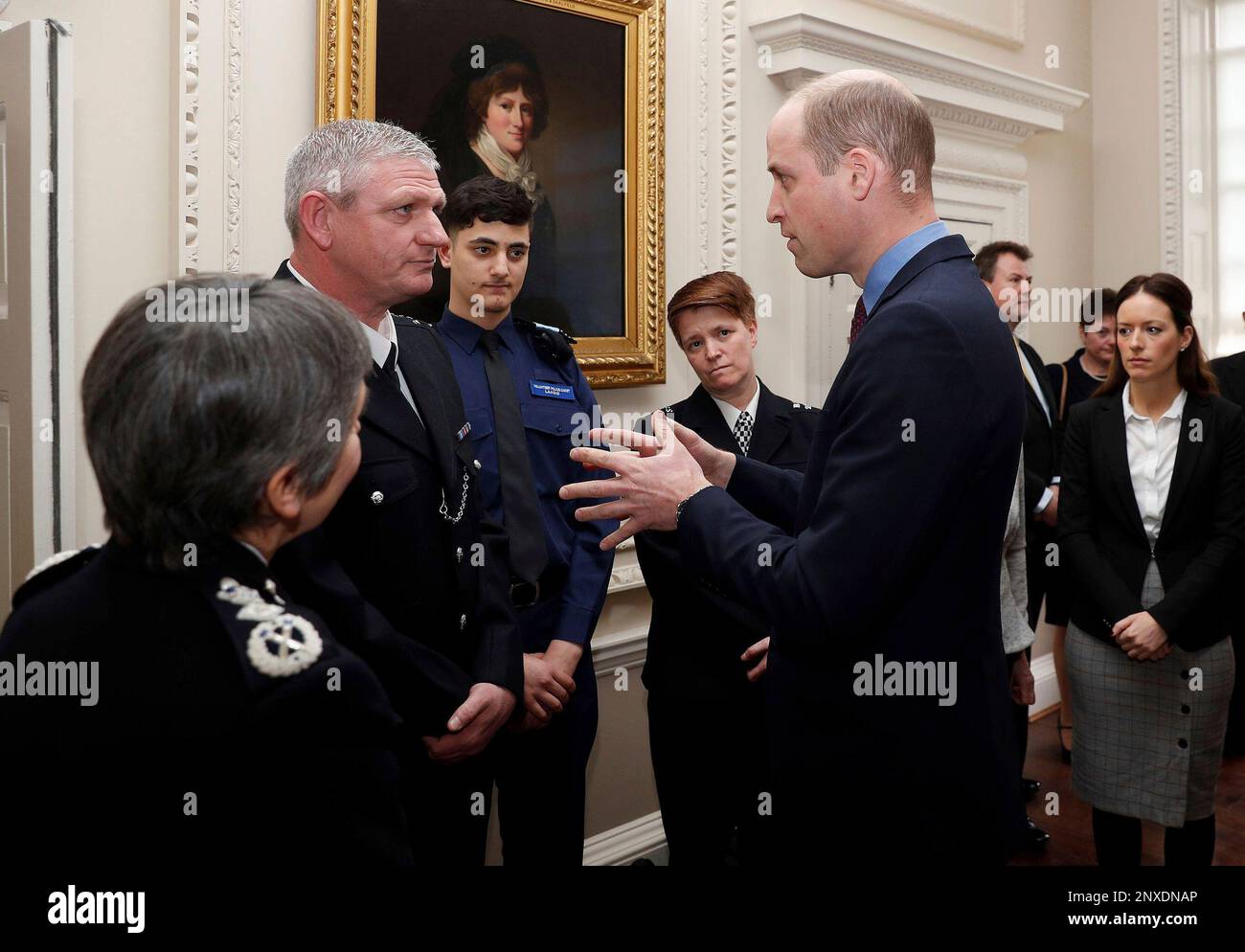 Britain's Prince William talks to police officers including PC Shaun ...