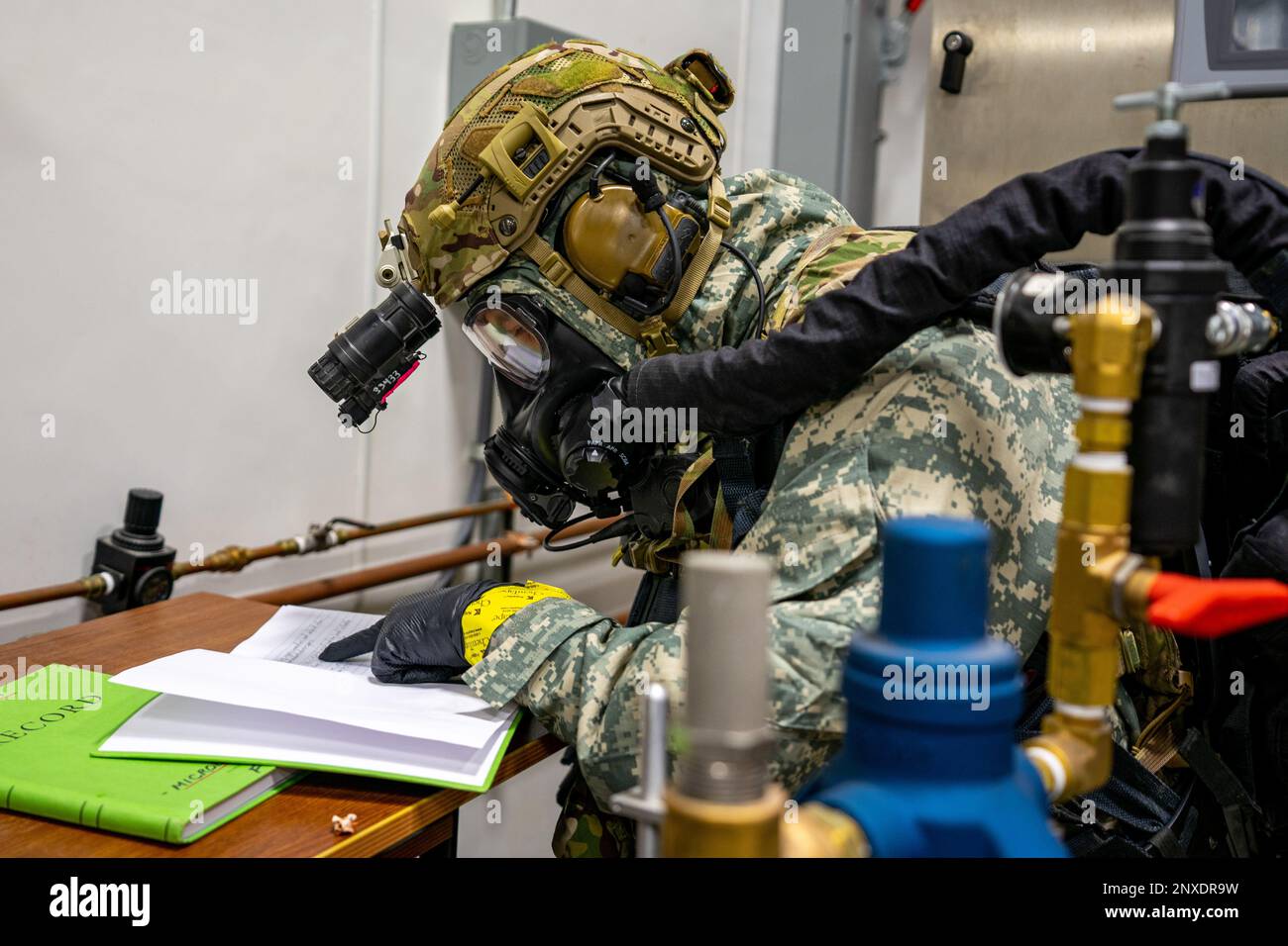 A Soldier assigned to the 56th Chemical Reconnaissance Detachment (CRD ...