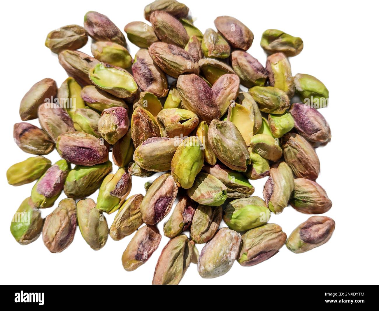 peeled pistachios isolated on white background Stock Photo - Alamy