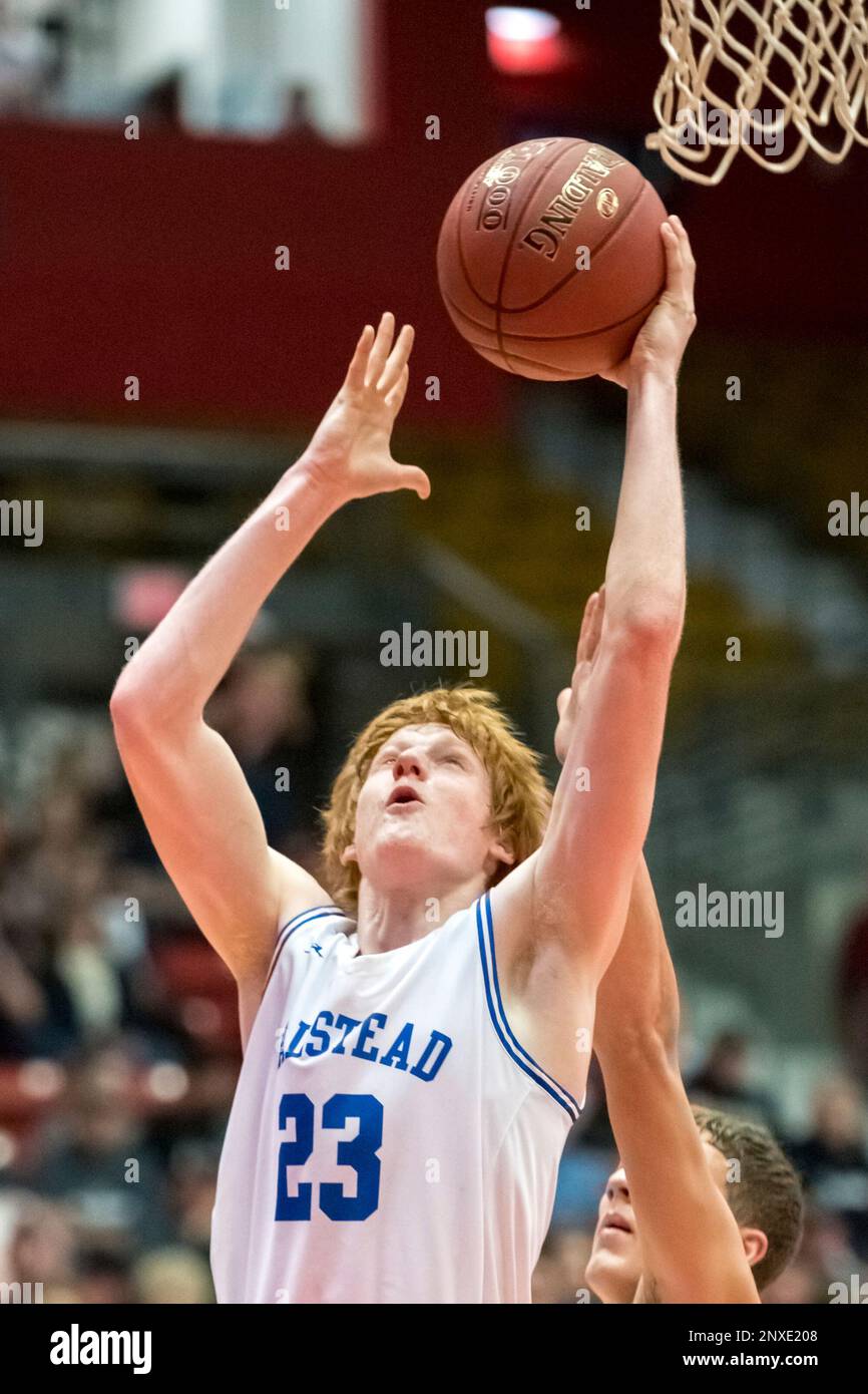 Halstead's Kason O'Neal (23) shoots as Phillipsburg's Jordan Ford ...