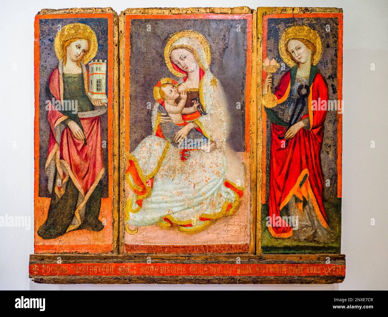 Triptych Madonna breastfeeding the Child between Santa Barbara and ...