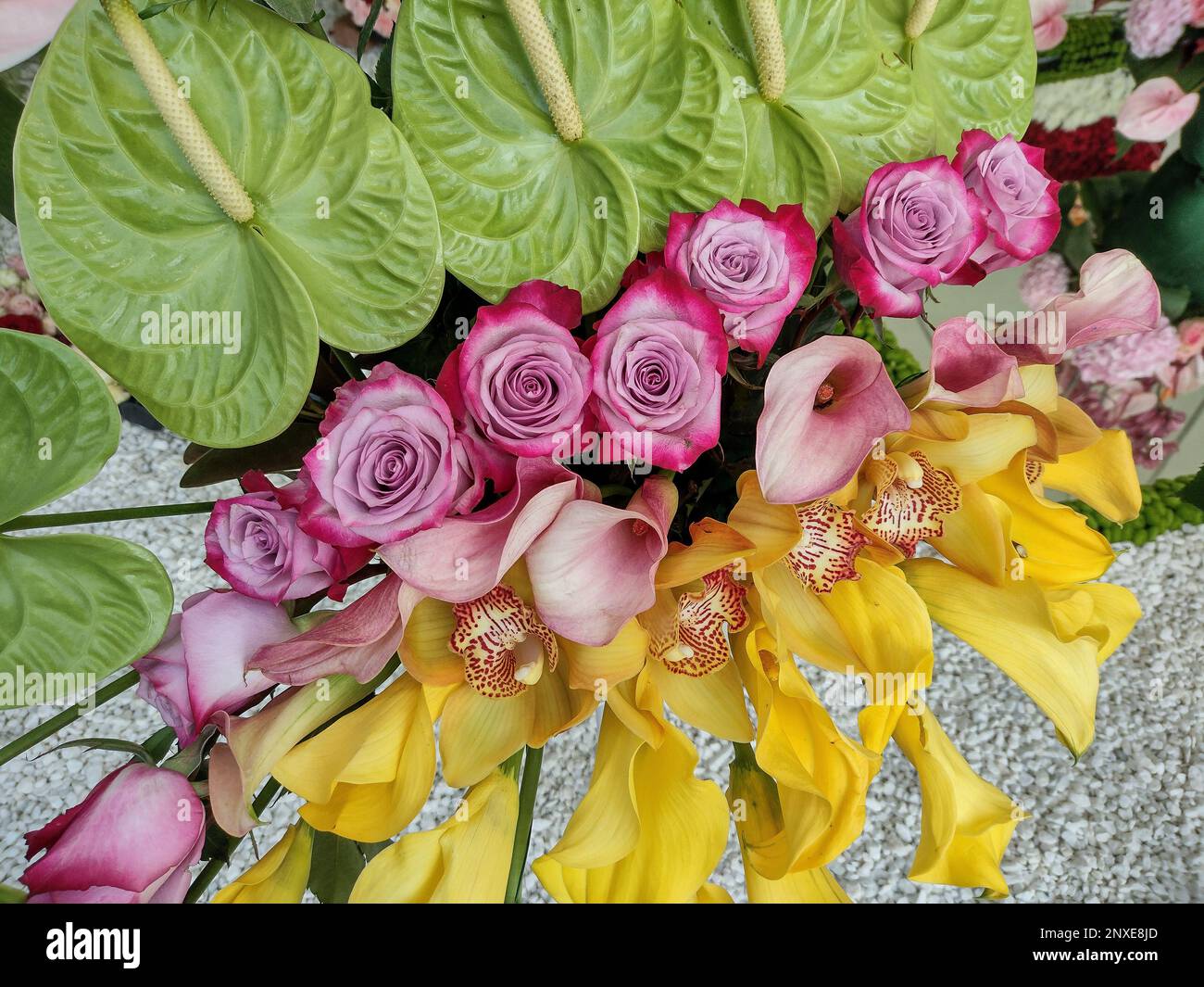 floral arrangement of calla lily, rose and yellow orchid Stock Photo ...