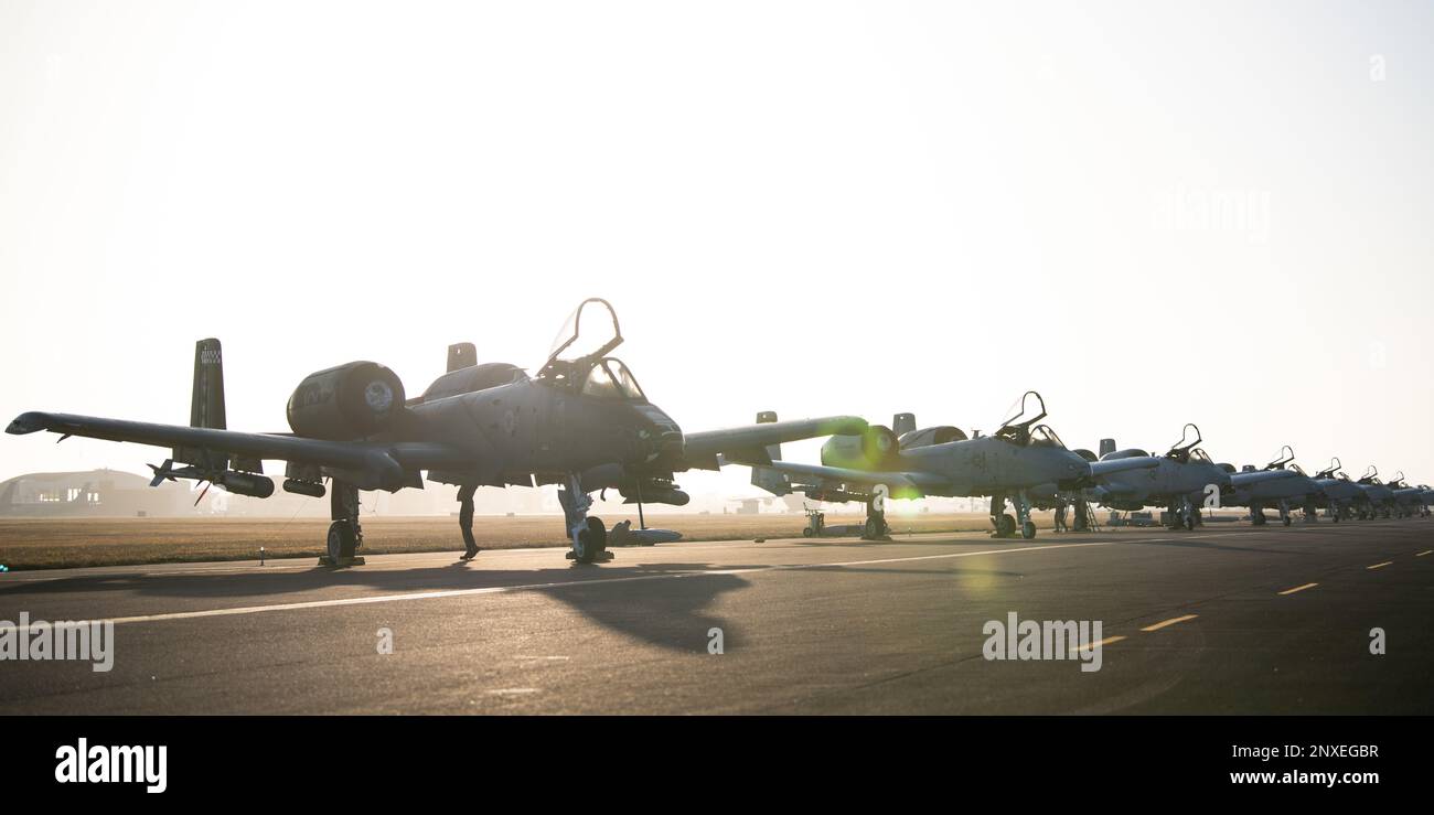 The sun rises over A-10C Thunderbolt II aircraft assigned to the 122nd ...