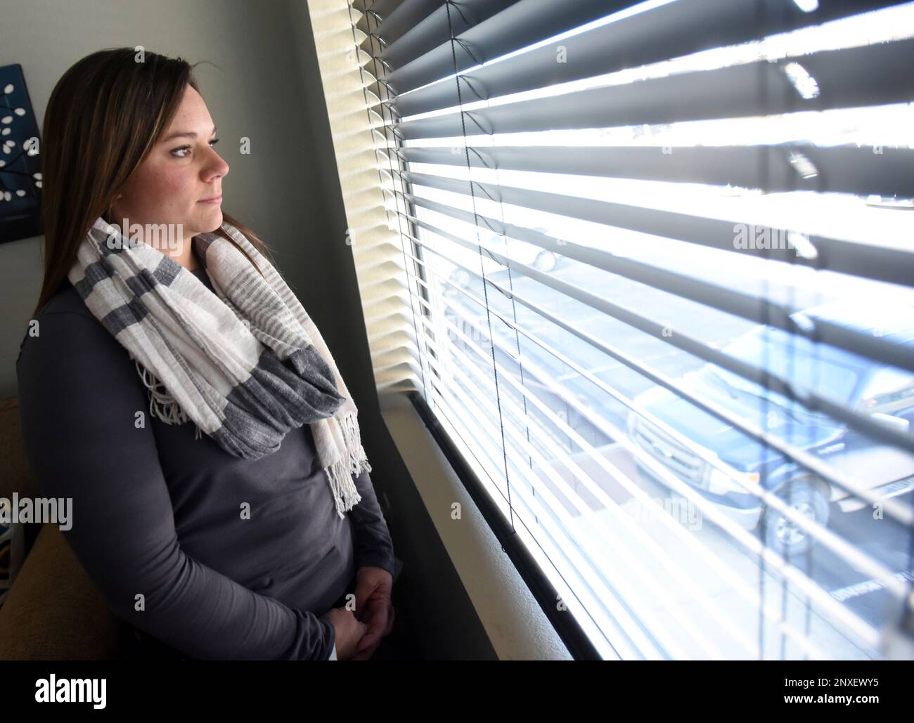 Andrea Schindle glances out the window of her office, 4625 20th St., in ...