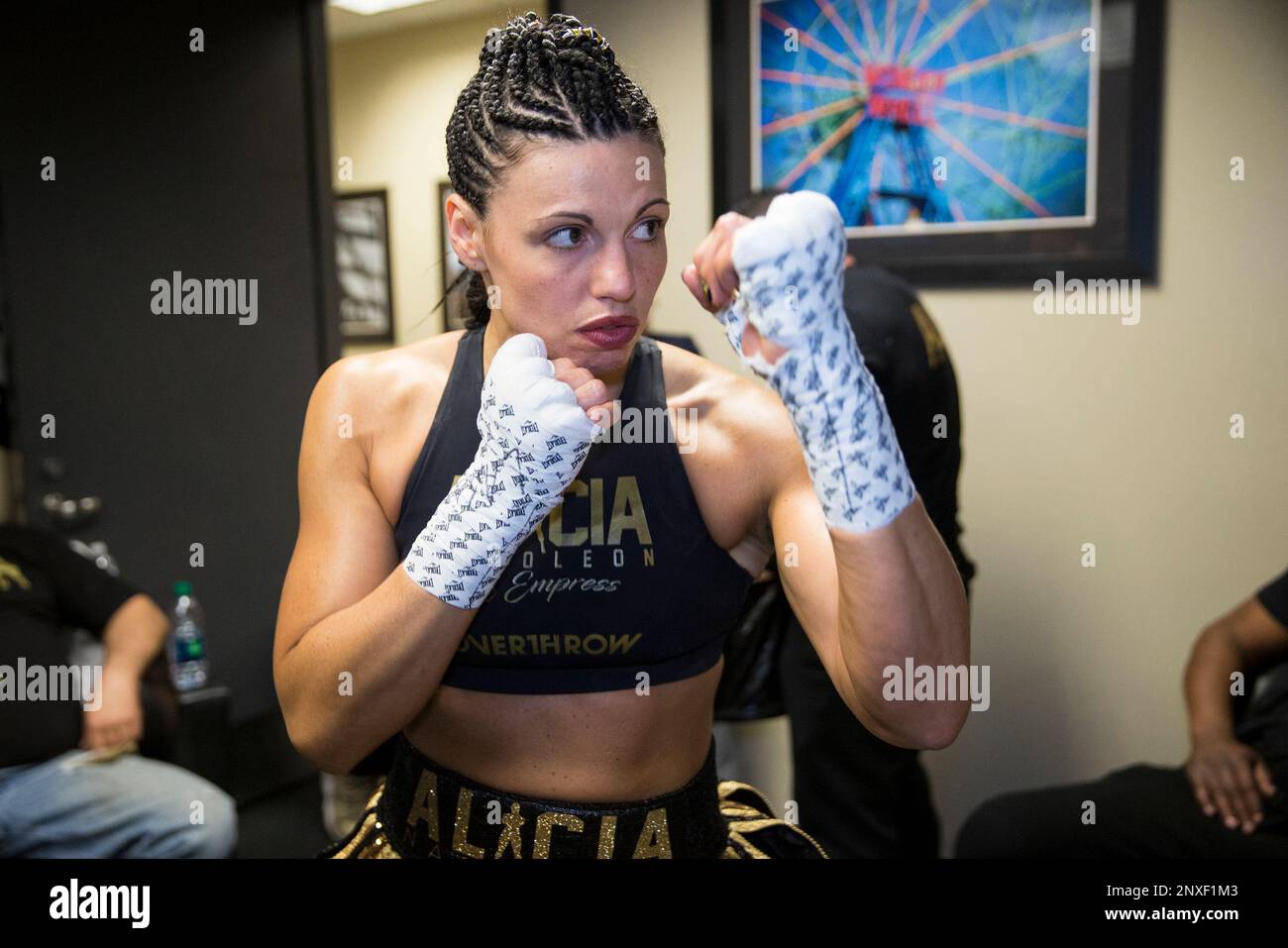 Female boxer Alicia Napoleon is seen in her locker room prior to her ...