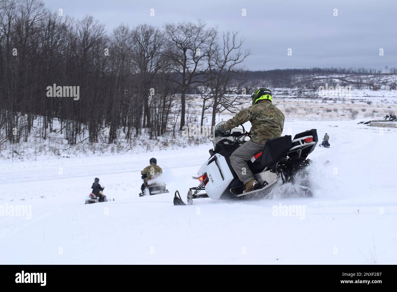 Members of the Michigan National Guard transit Grayling Aerial Gunnery ...