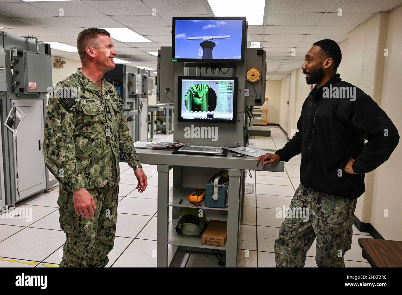 GREAT LAKES, Ill. (Feb. 23, 2023) Force Master Chief Jason Knupp, left ...