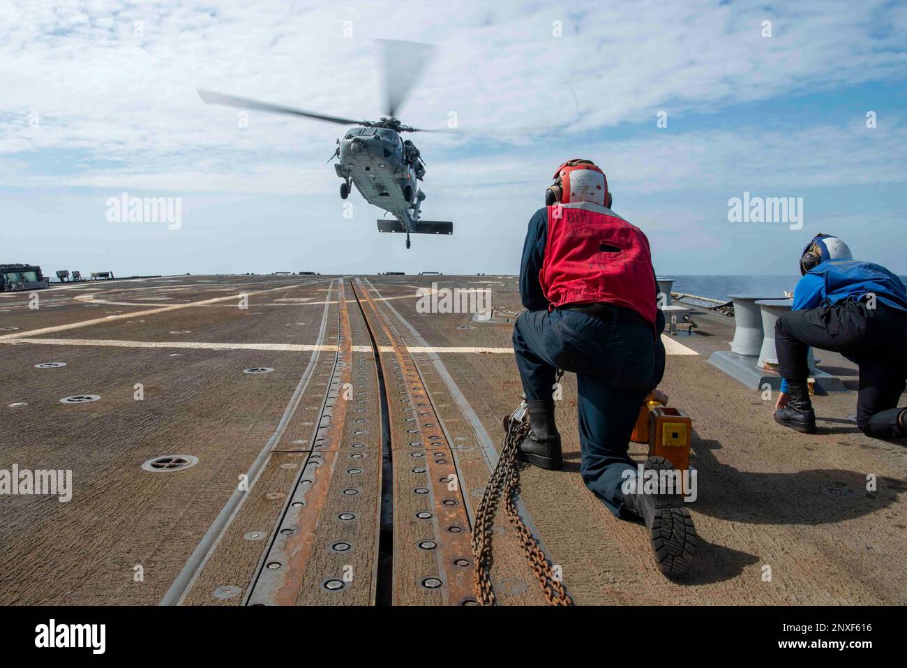230206-N-MK109-1062 SOUTH CHINA SEA (Feb. 6, 2023) An MH-60S Seahawk ...